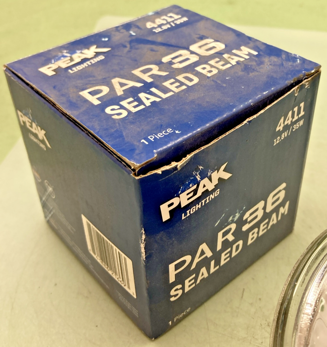 NEW GENUINE PEAK LIGHTING 4411 PAR 36 SEALED BEAM – Merica Powersports